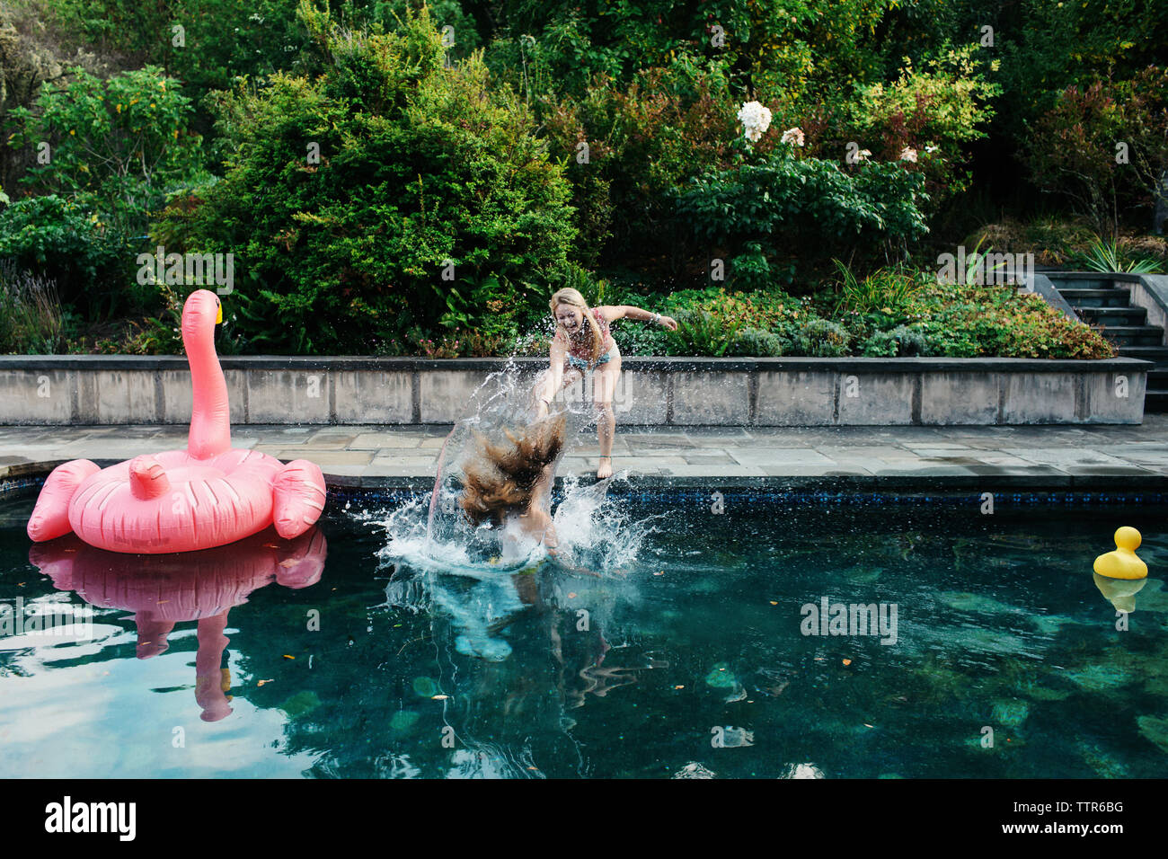 Pushing into pool hi-res stock photography and images - Alamy
