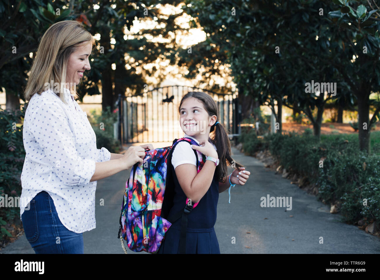 Girl packing backpack school hi-res stock photography and images - Alamy