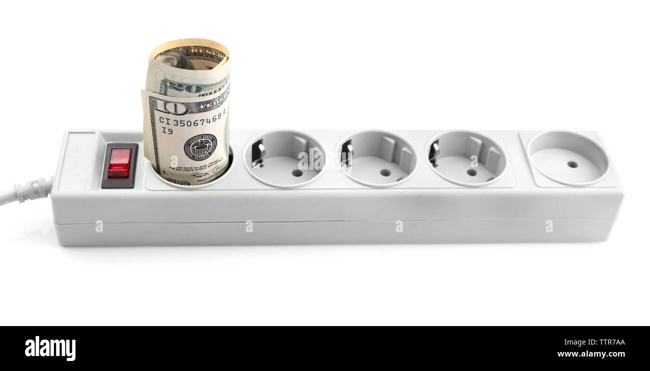 Dollars in power socket on white background Stock Photo - Alamy