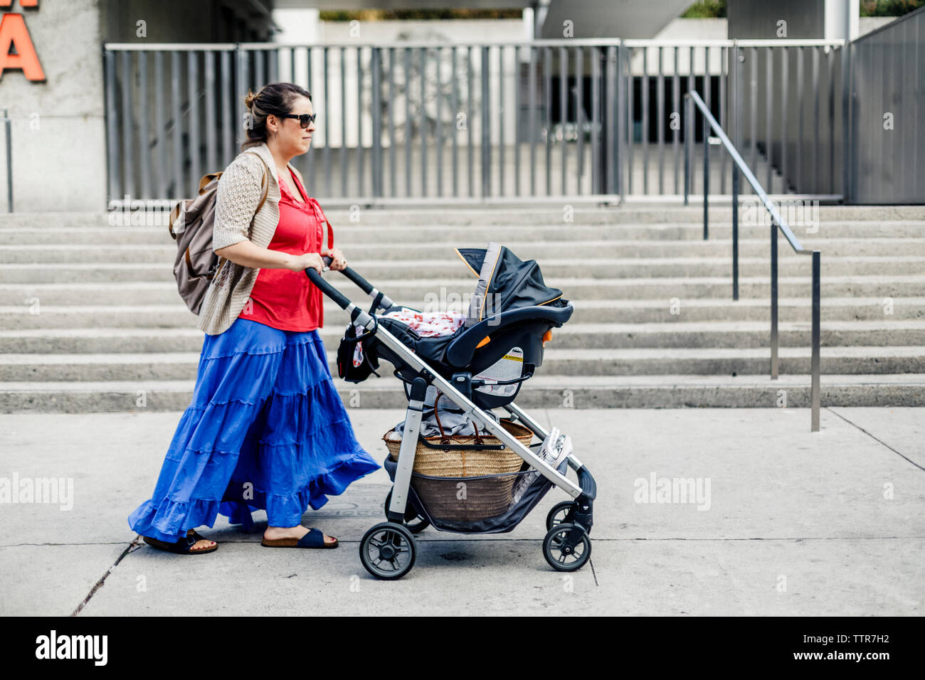 Pulling stroller hi-res stock photography and images - Alamy