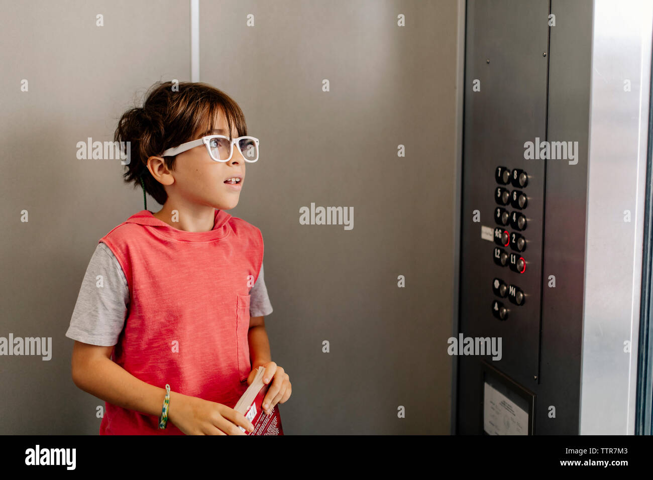 Person inside elevator hi-res stock photography and images - Alamy