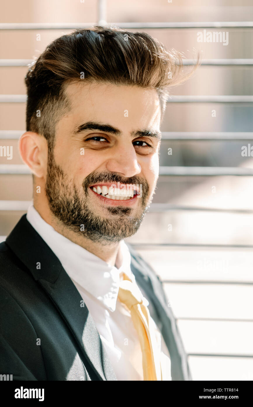 Smiling man in suit hi-res stock photography and images - Alamy
