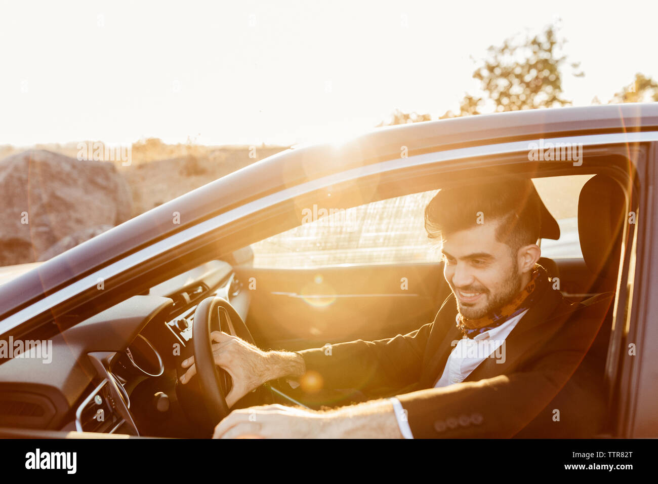 Person smiling while driving hi-res stock photography and images - Alamy