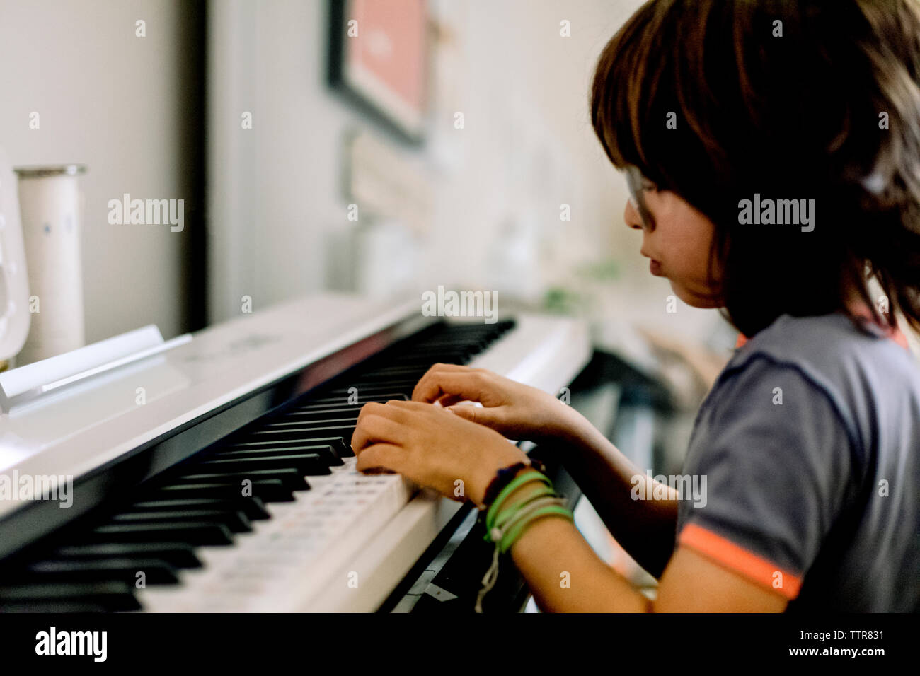 Child with instrument hi-res stock photography and images - Alamy