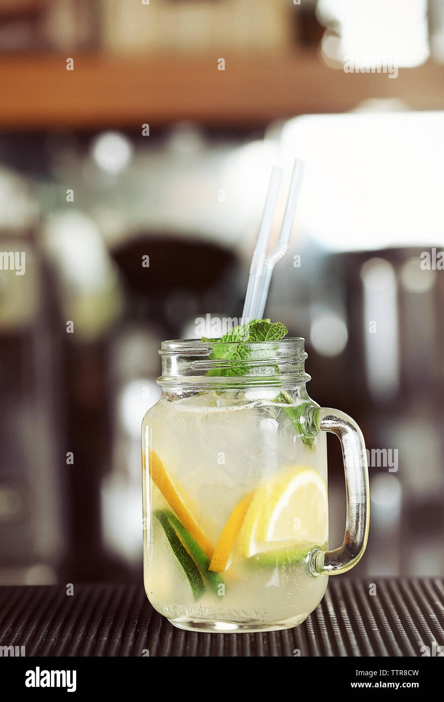 Cocktail in glass jar on bar counter Stock Photo - Alamy