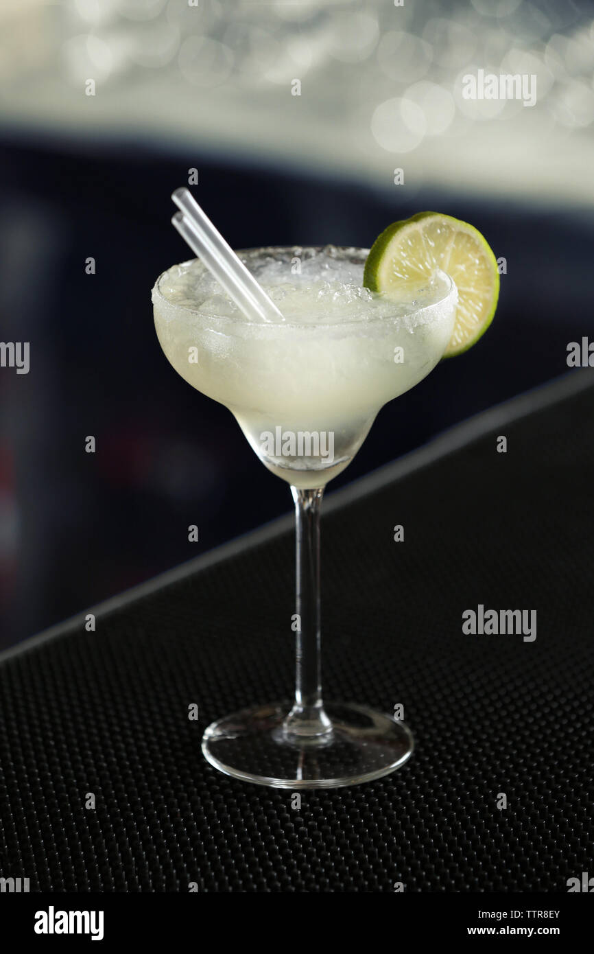 Cocktail in glass on bar counter Stock Photo - Alamy