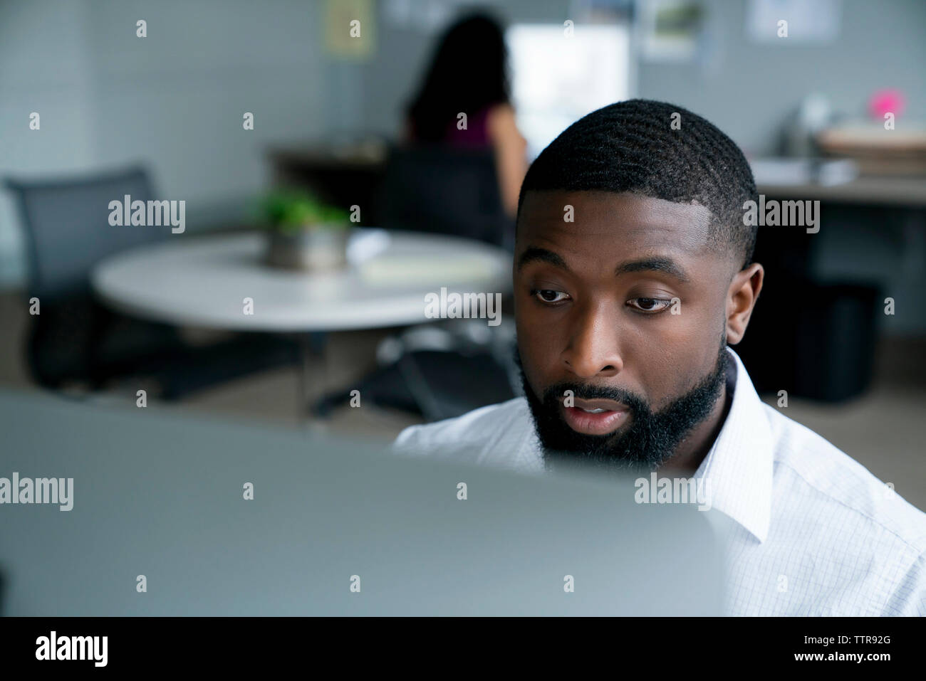 business people using desktop computers in office Stock Photo - Alamy