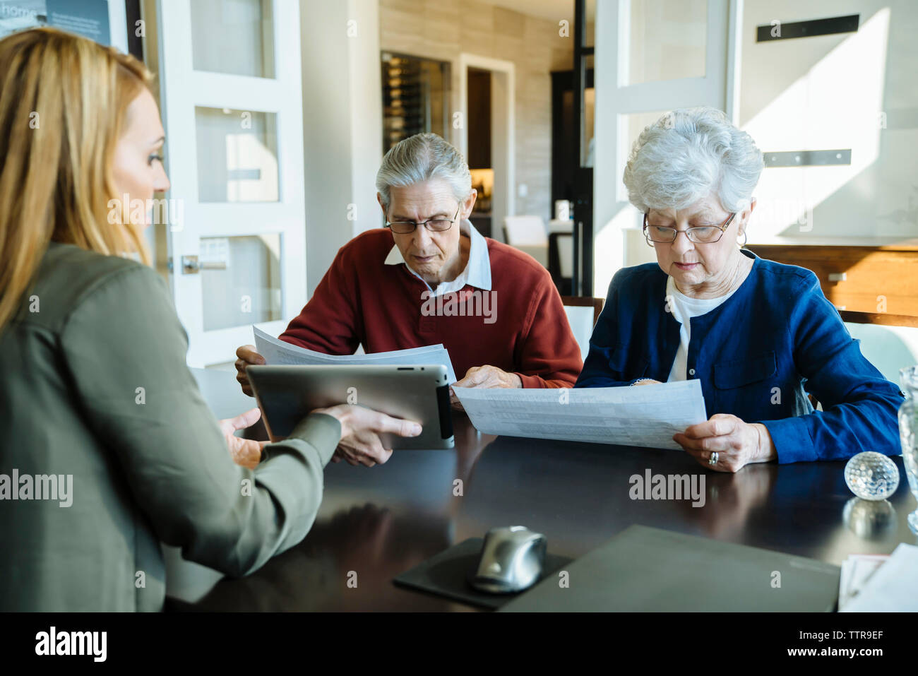 Woman office meeting couple senior hi-res stock photography and images ...