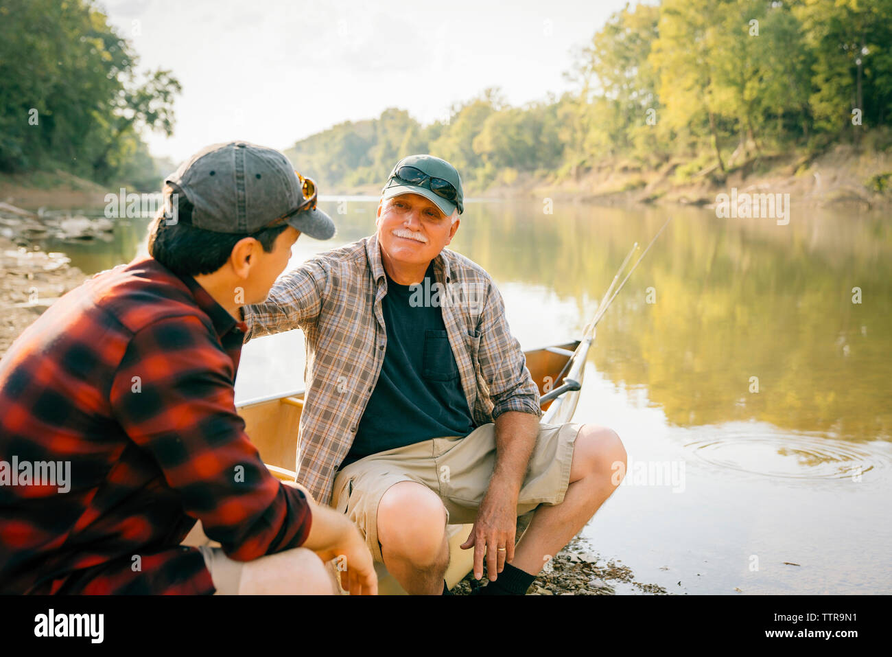 Two friends lake talking hi-res stock photography and images - Alamy