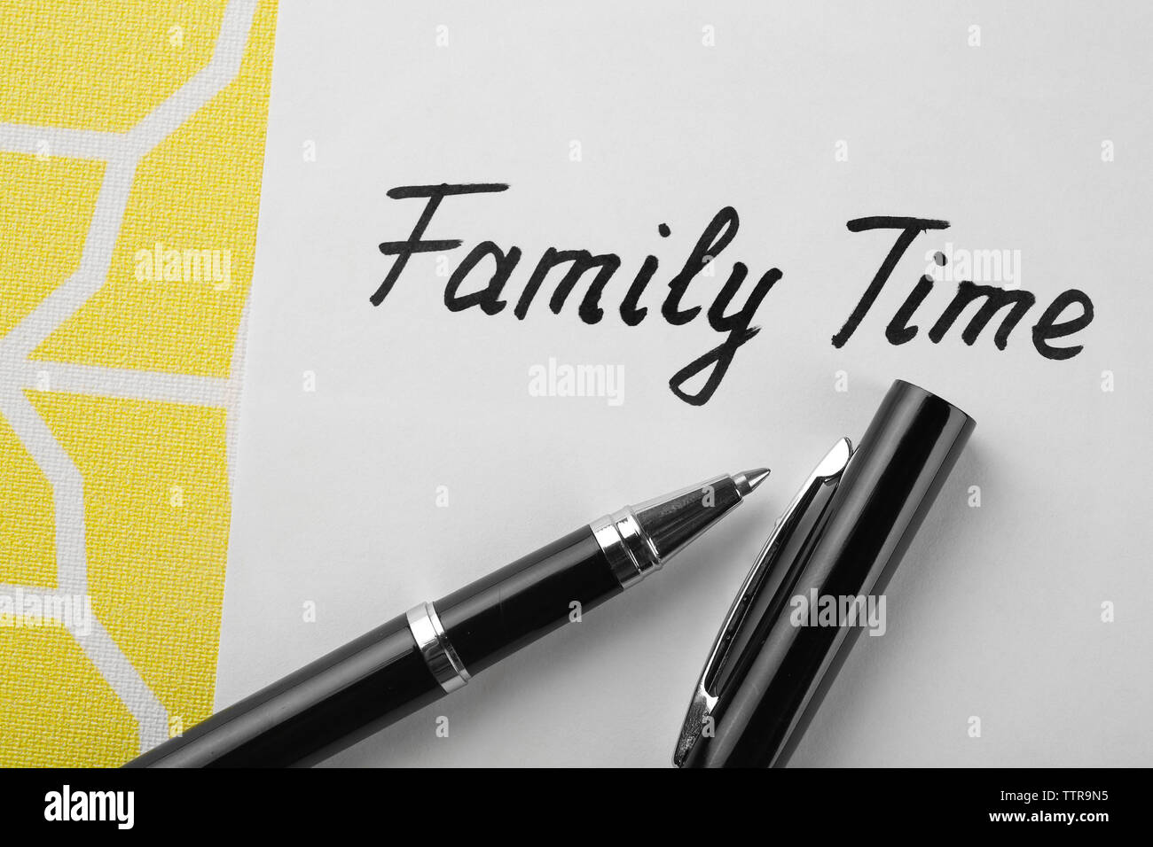 Paper sheet with words Family time, close up Stock Photo - Alamy