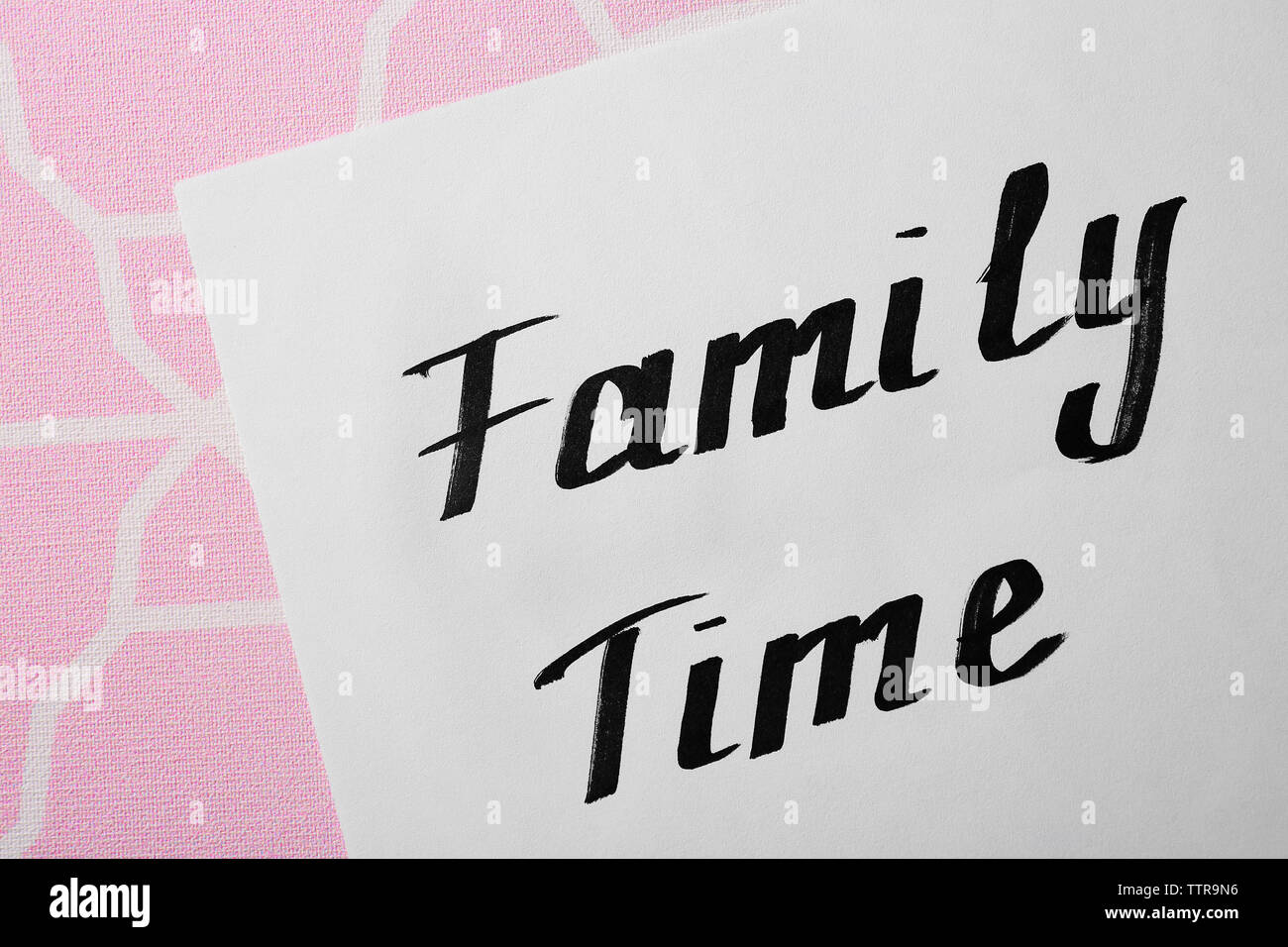 Paper sheet with words Family time, close up Stock Photo - Alamy