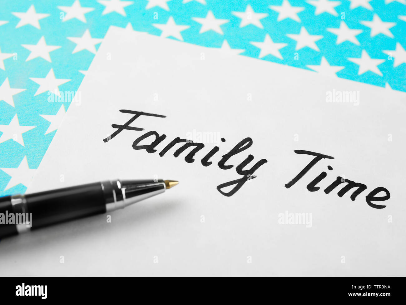 Paper sheet with words Family time, close up Stock Photo - Alamy