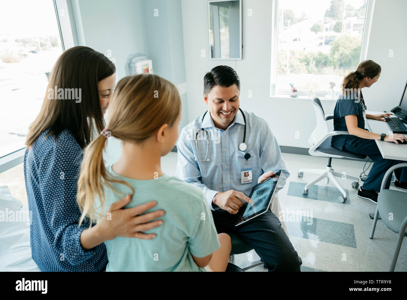 Woman Pediatrician At Work