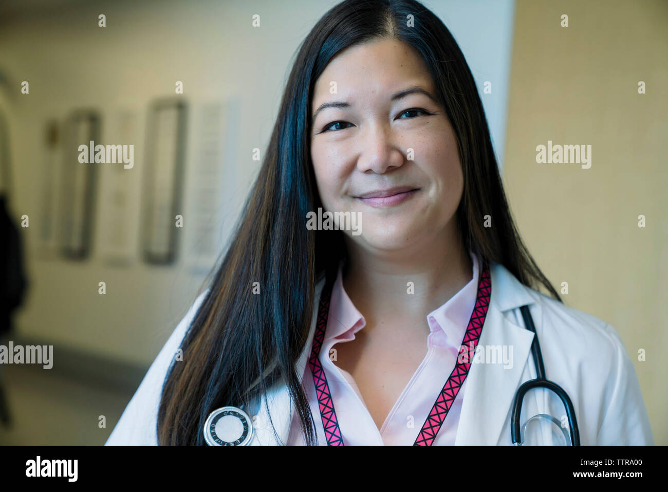 Portrait of confident female doctor in hospital Stock Photo - Alamy