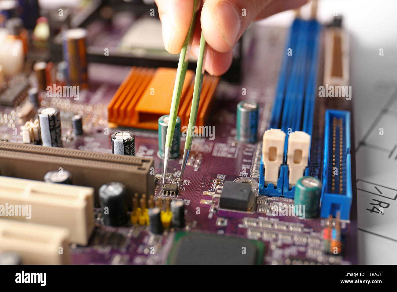 Man repairing mother board hi-res stock photography and images - Alamy