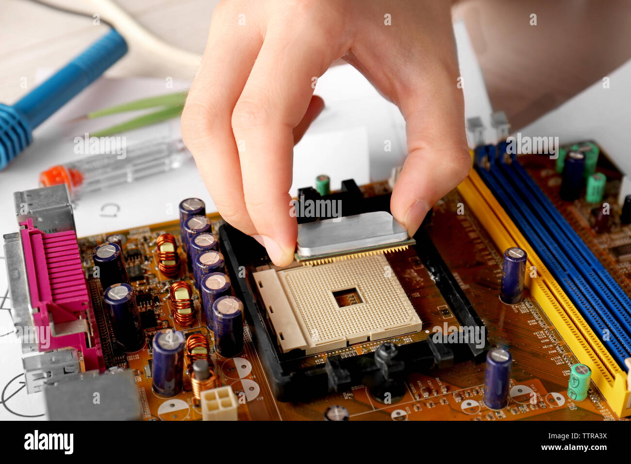 Man repairing mother board hi-res stock photography and images - Alamy