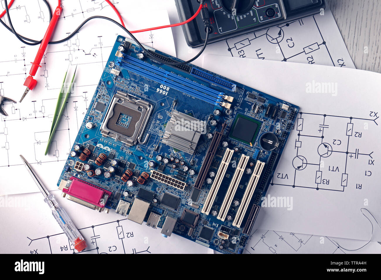 Broken motherboard in service center Stock Photo - Alamy