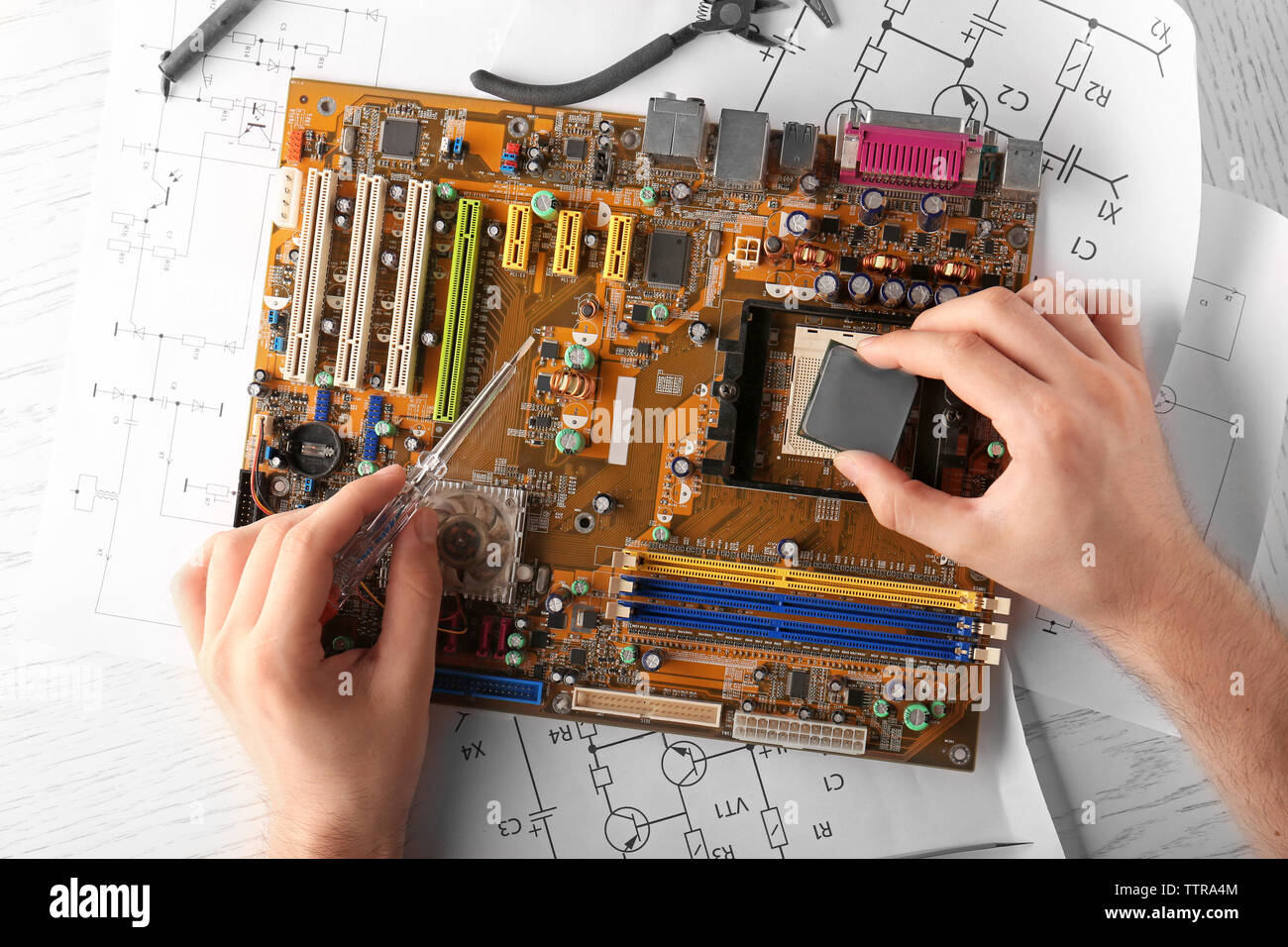Man repairing mother board hi-res stock photography and images - Alamy