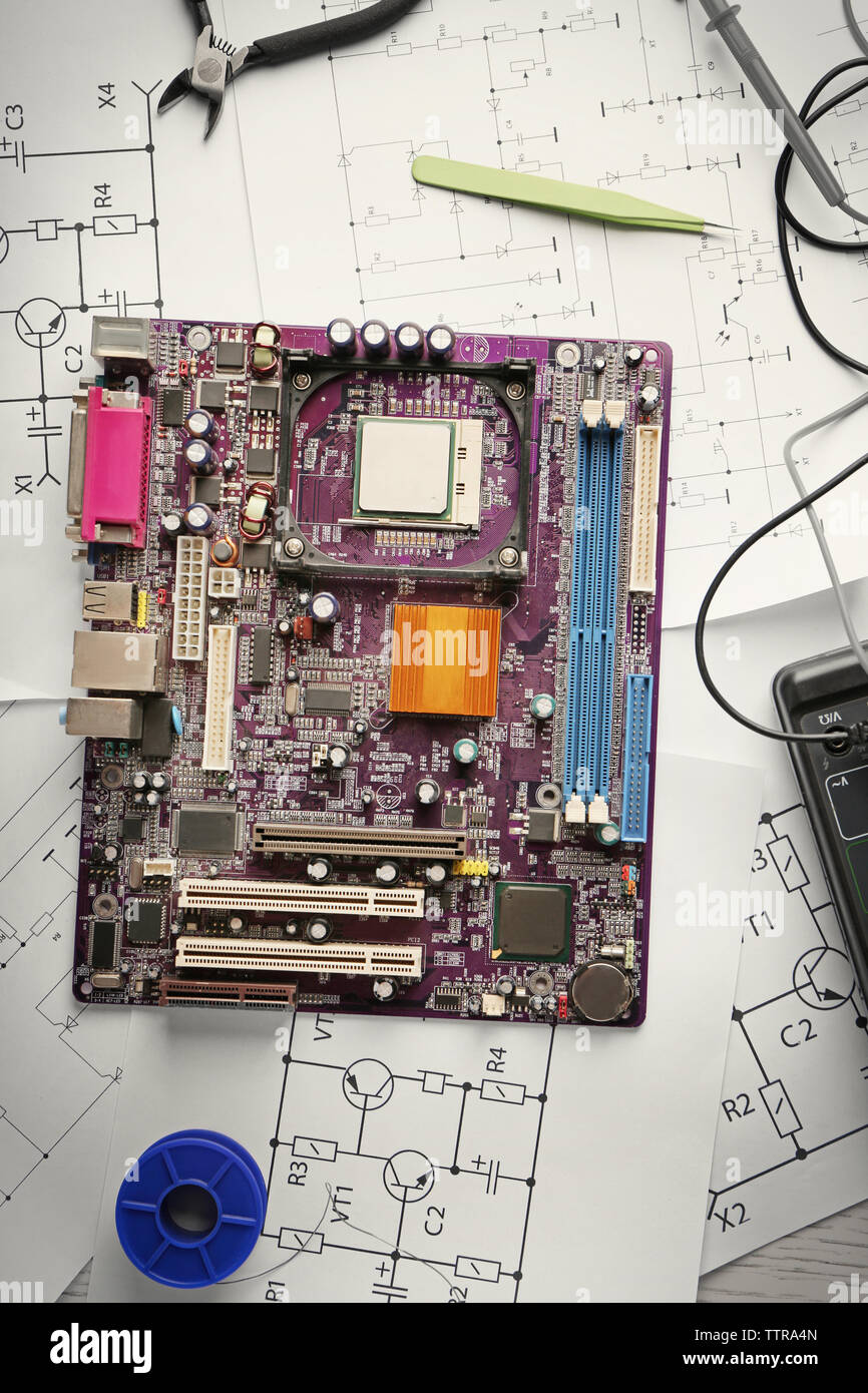 Broken motherboard in service center Stock Photo - Alamy