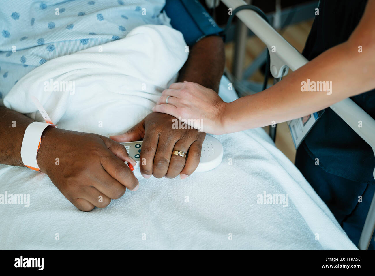 Two people touching close up hi-res stock photography and images - Alamy