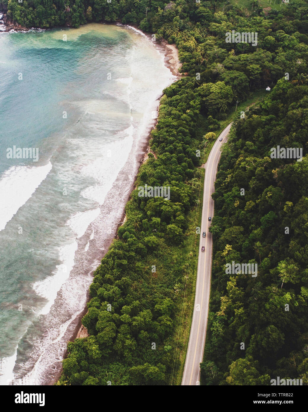 High angle view of country road amidst trees Stock Photo - Alamy