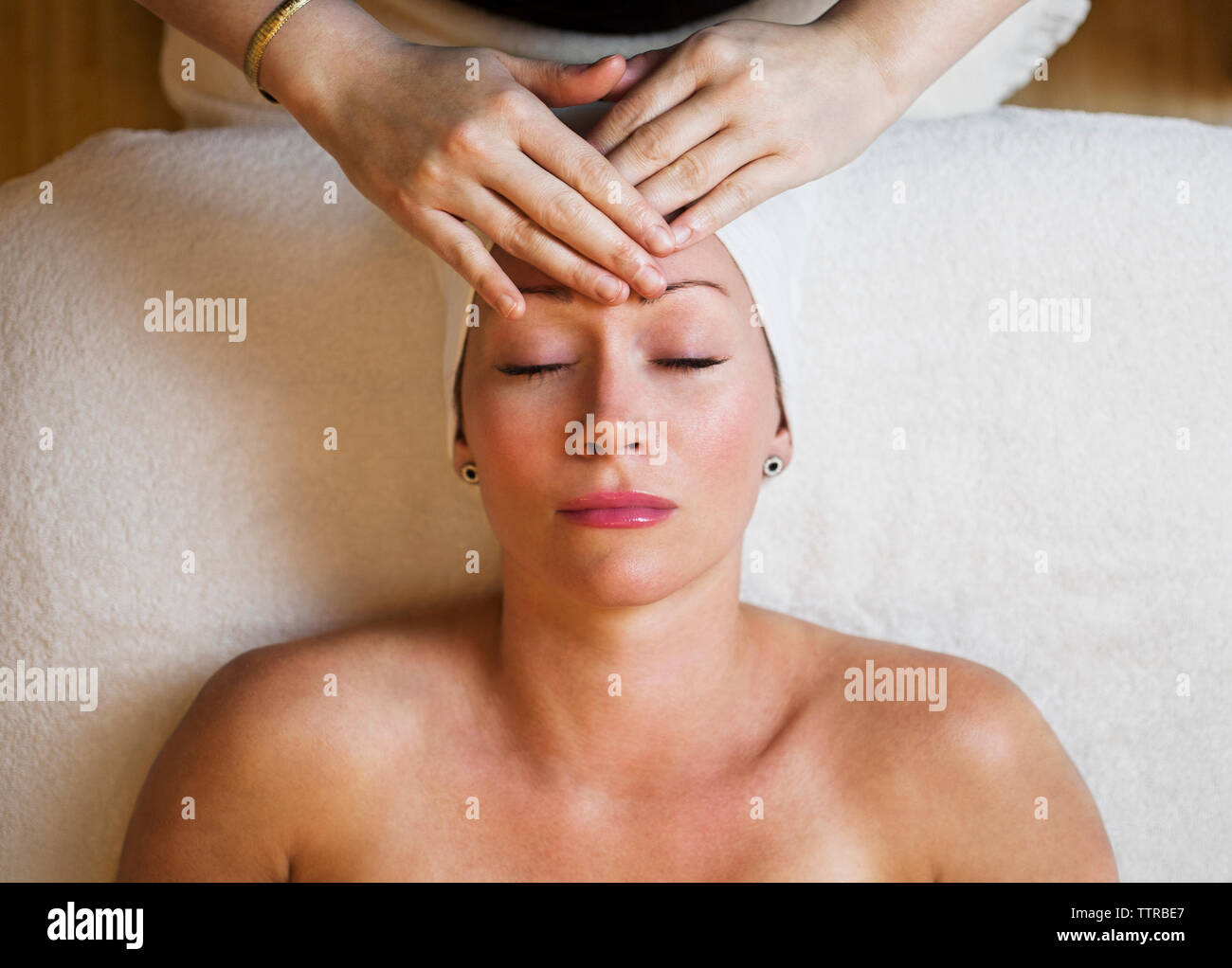 Overhead view of woman enjoying massage in spa Stock Photo - Alamy