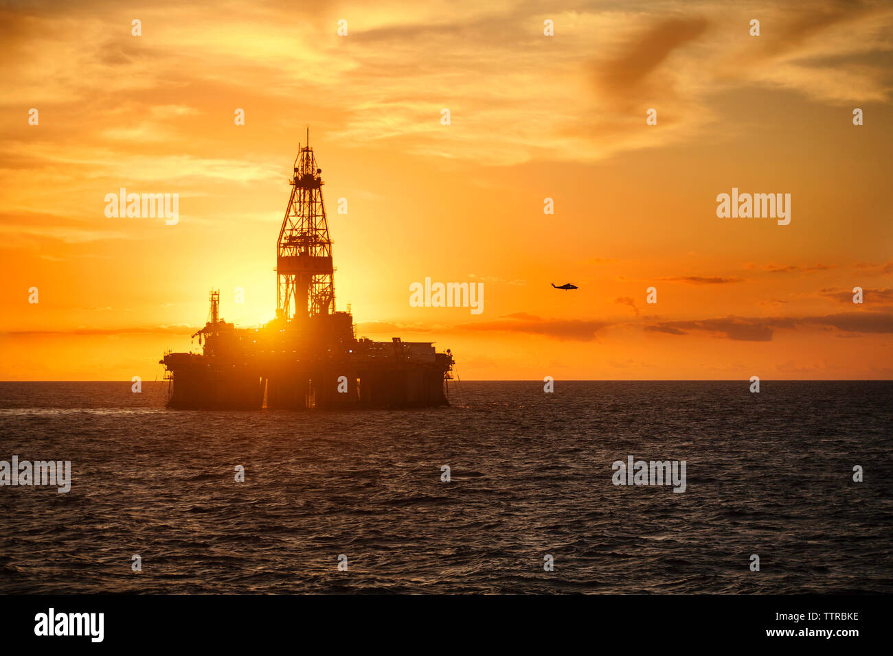 Oil Platform Sunset Sea High Resolution Stock Photography and Images ...