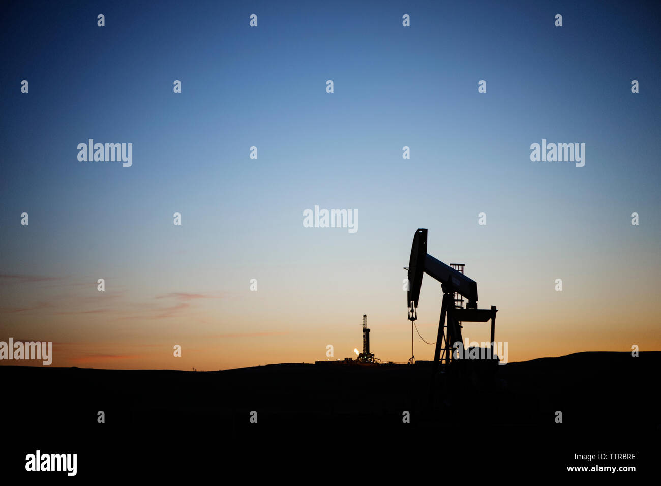 A Well Digging Silhouette