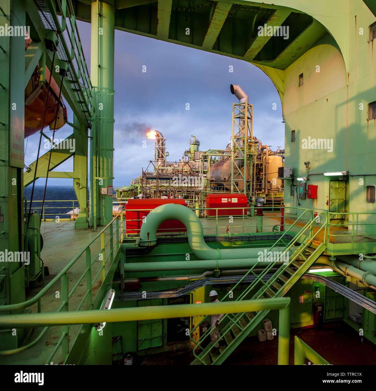 Machineries in oil production platform Stock Photo - Alamy