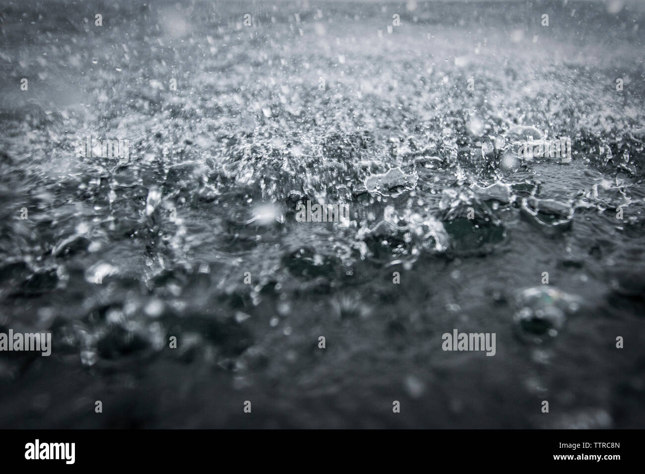 Close-up of water in sea during rainy season Stock Photo - Alamy