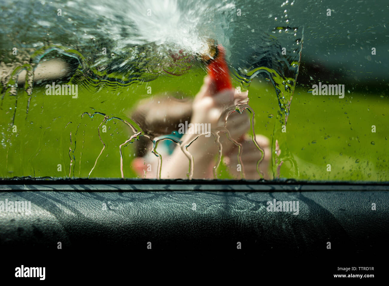 Boy washing car hi-res stock photography and images - Alamy