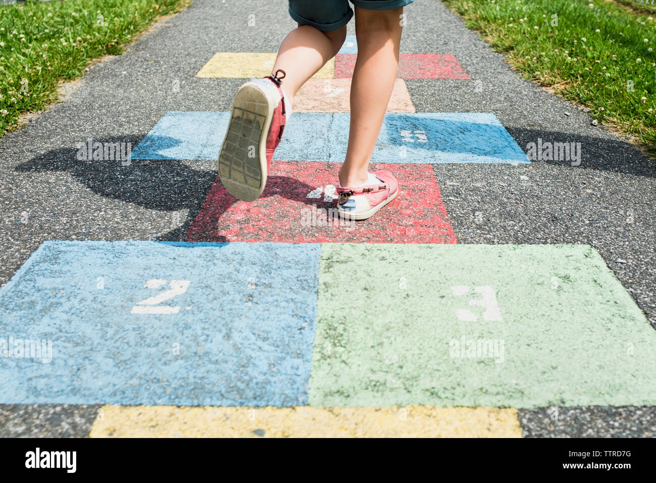 Jumping hopscotch hi-res stock photography and images - Alamy