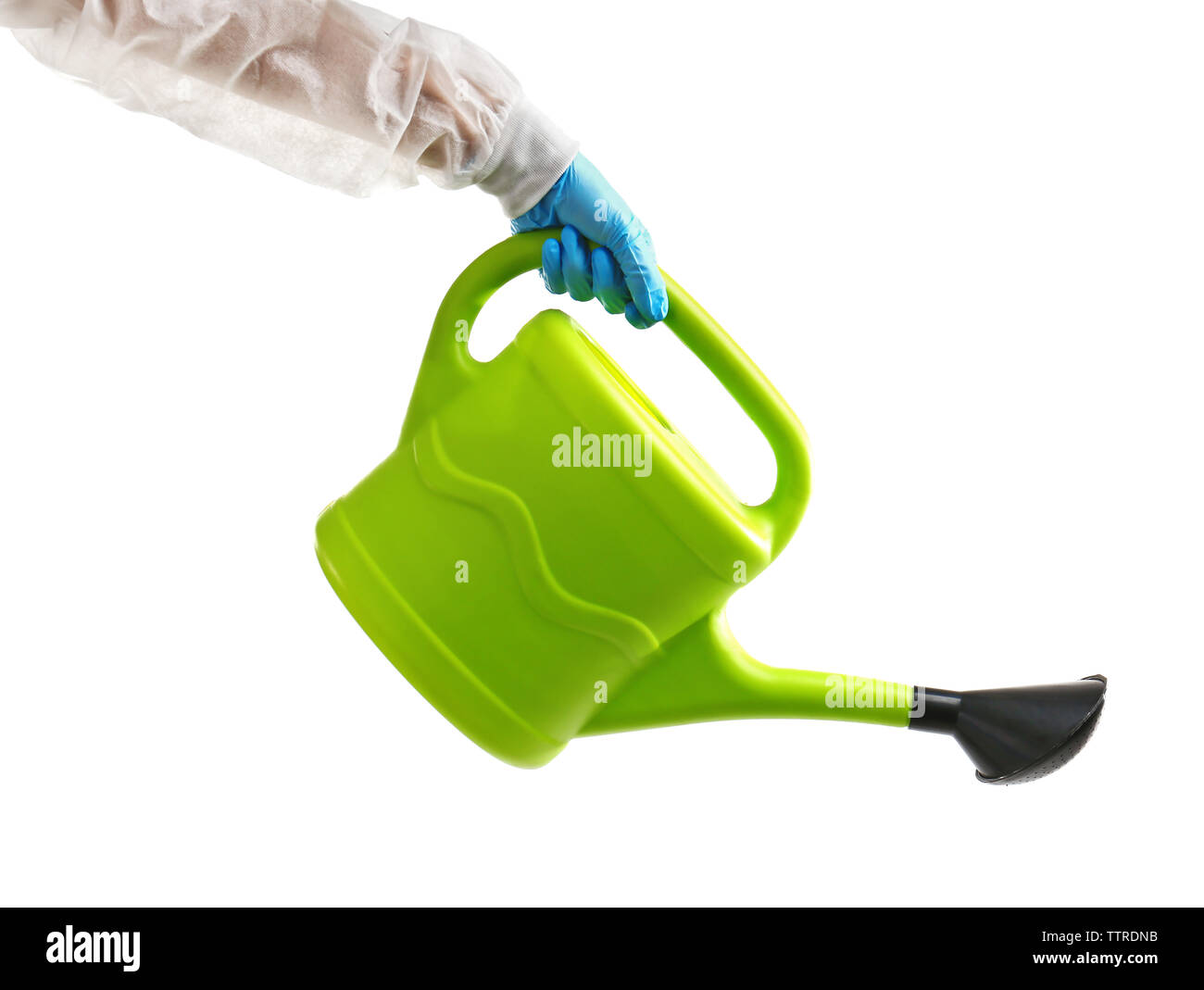 Hand holding watering can isolated on white Stock Photo - Alamy