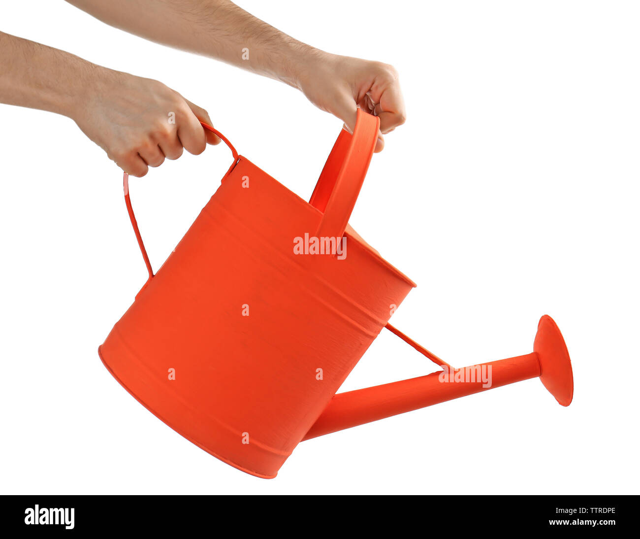 Hand holding watering can isolated on white Stock Photo - Alamy