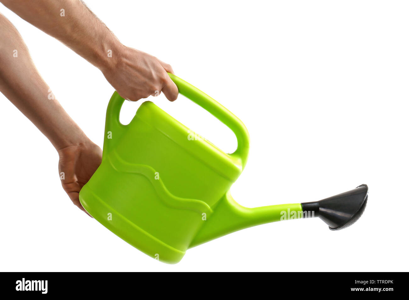 Hand holding watering can isolated on white Stock Photo - Alamy