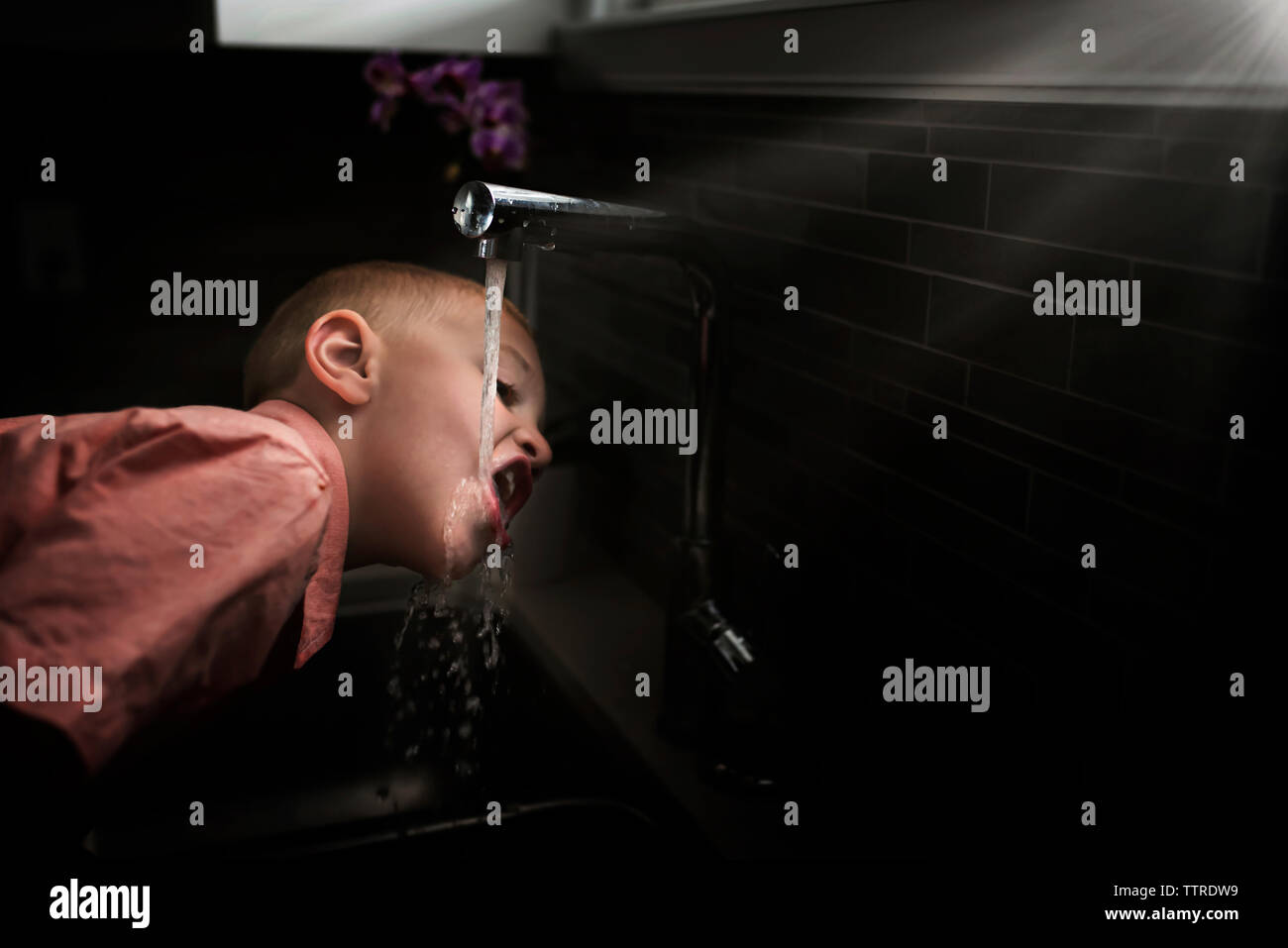 Drinking from water faucet hi-res stock photography and images - Alamy