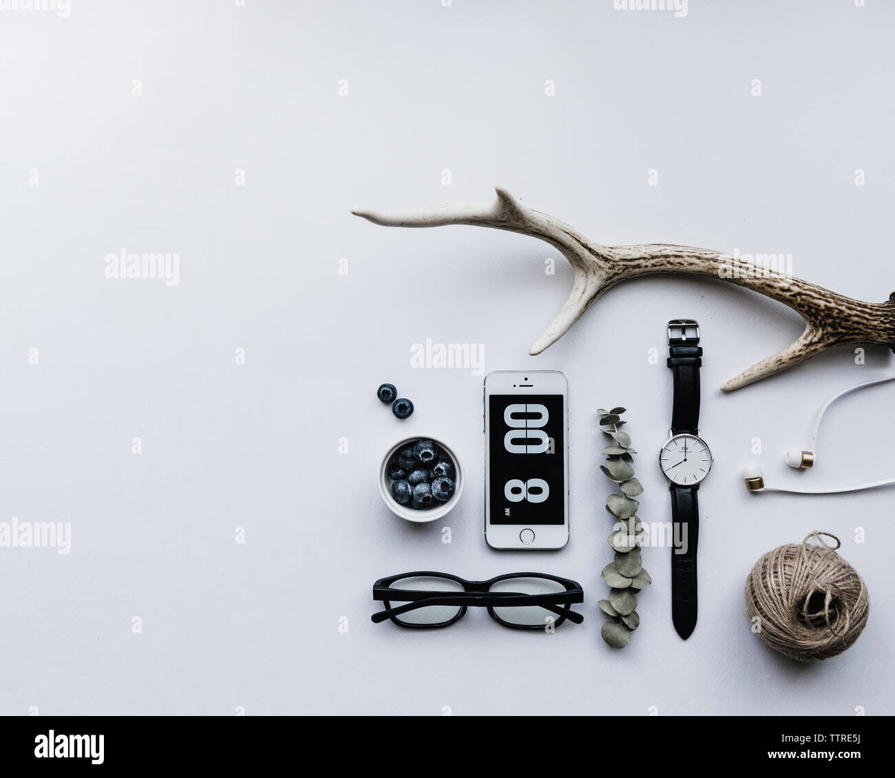 Overhead view of various objects against white background Stock Photo ...