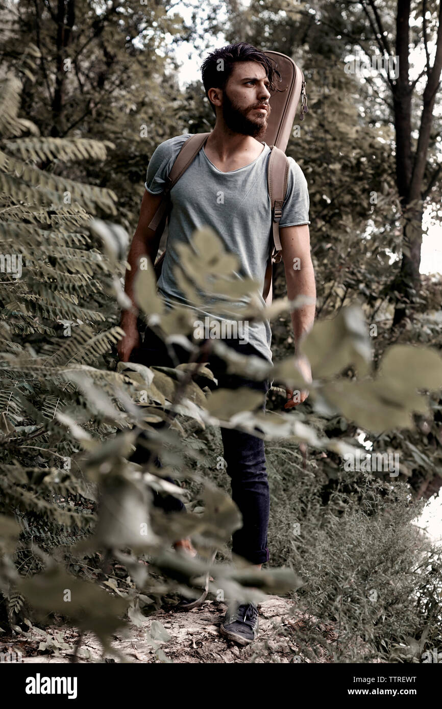 Man standing backpack hi-res stock photography and images - Alamy