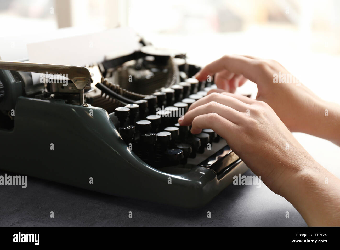 Typewriter hands close hi-res stock photography and images - Alamy
