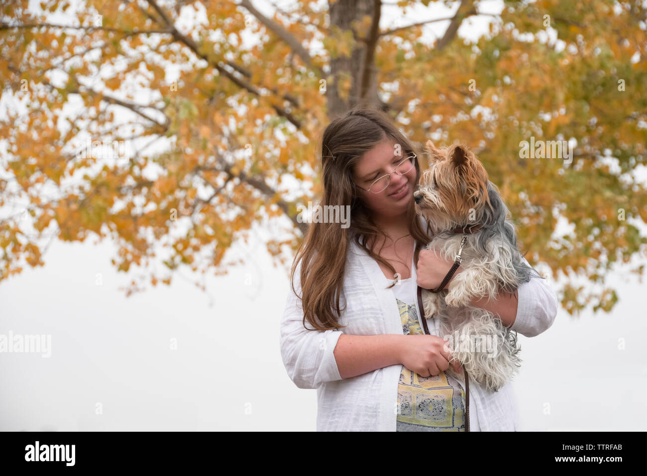 Child standing front of tree hi-res stock photography and images - Alamy