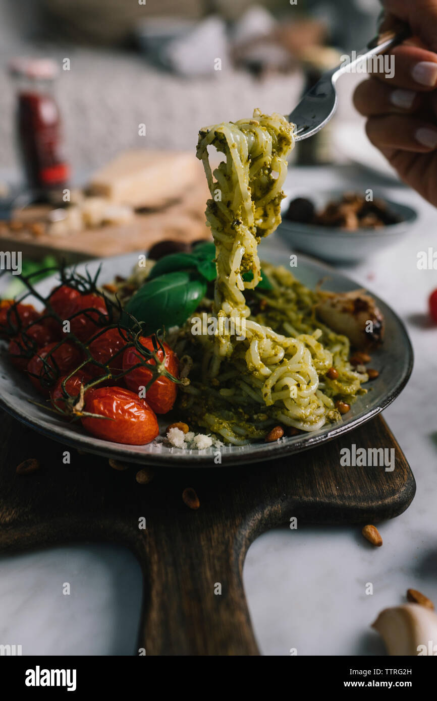 Hand with spaghetti hi-res stock photography and images - Alamy
