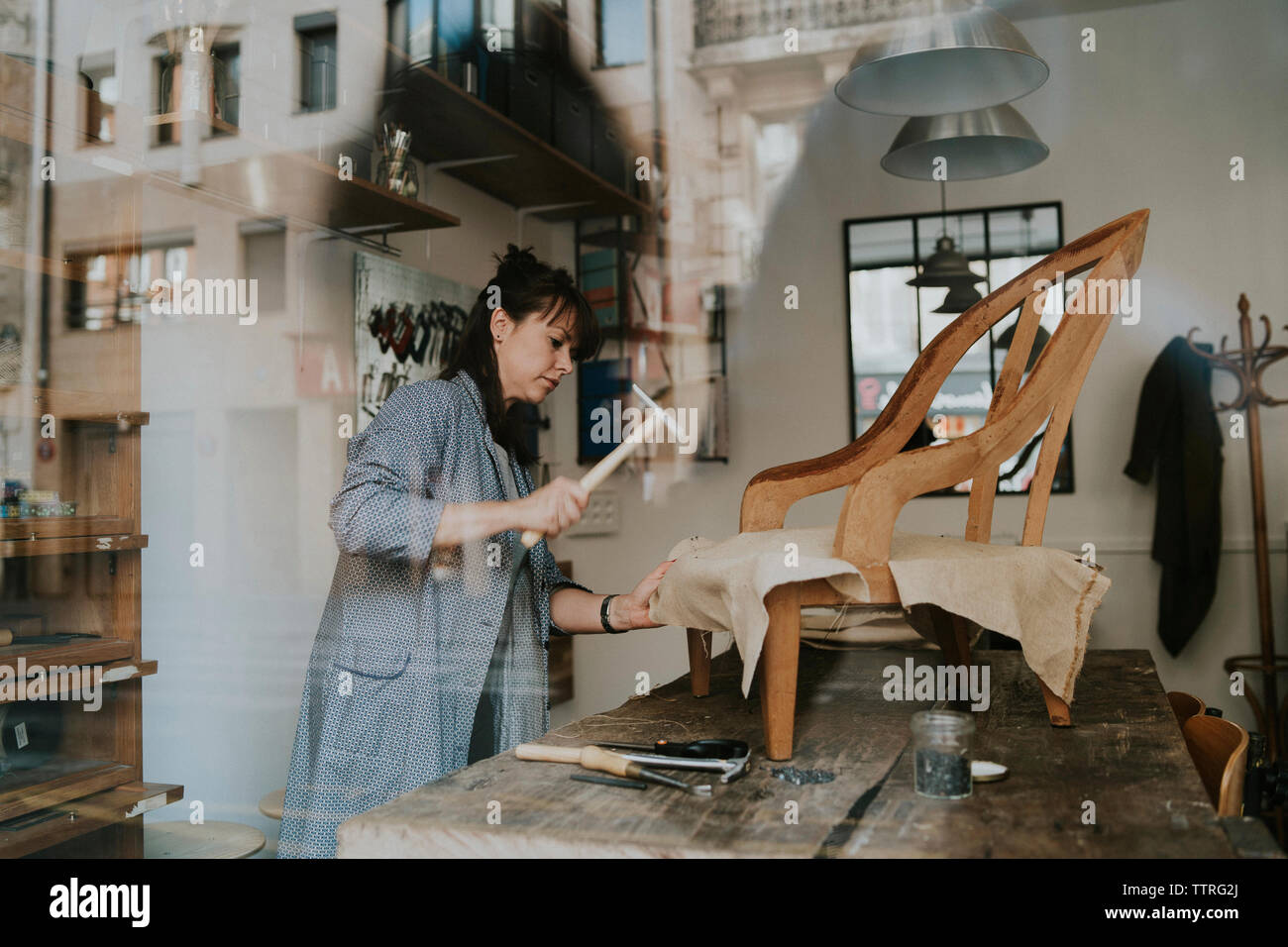 Female wooden chair making hi-res stock photography and images - Alamy