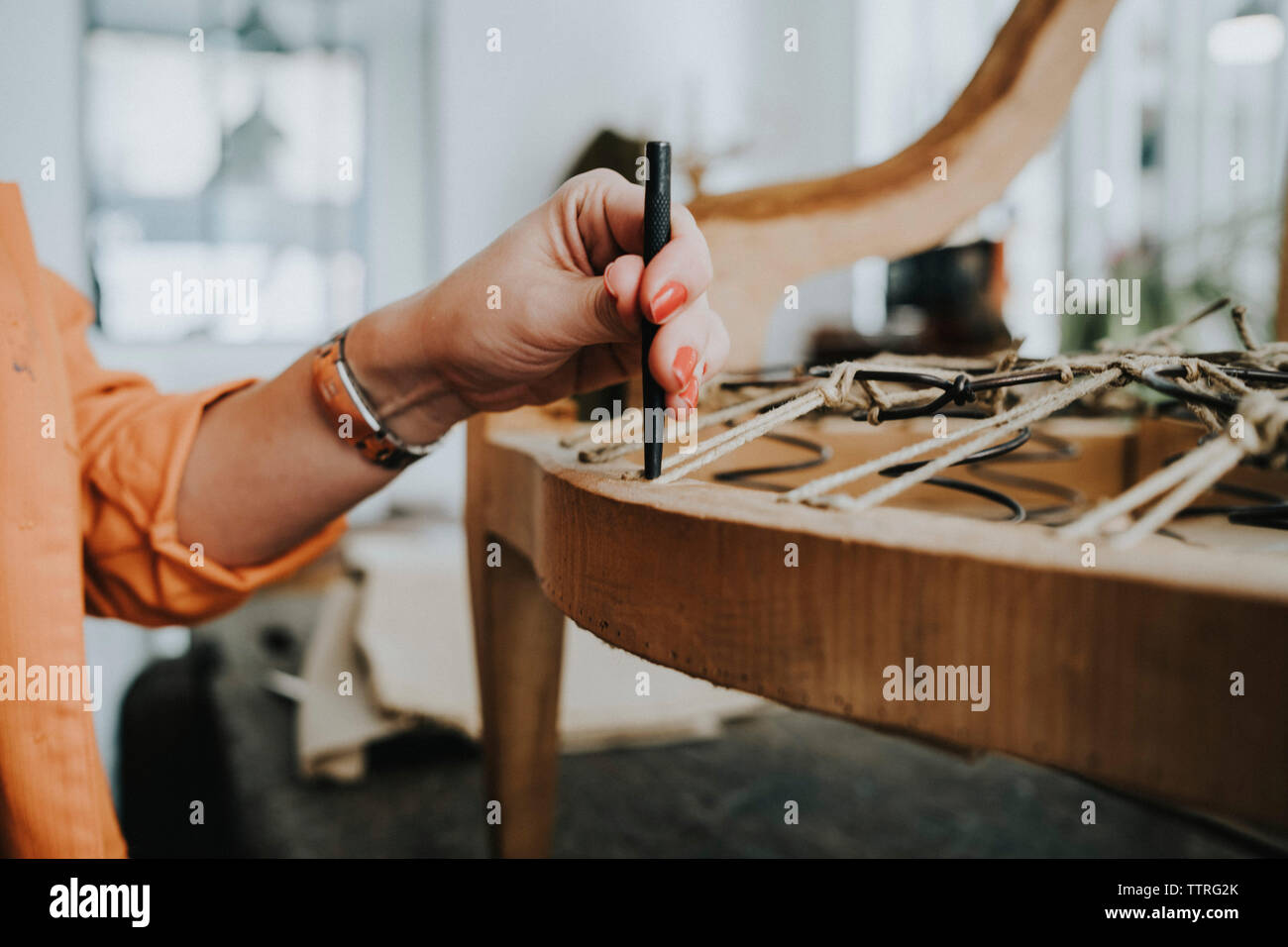 Female craftsperson chair hi-res stock photography and images - Alamy