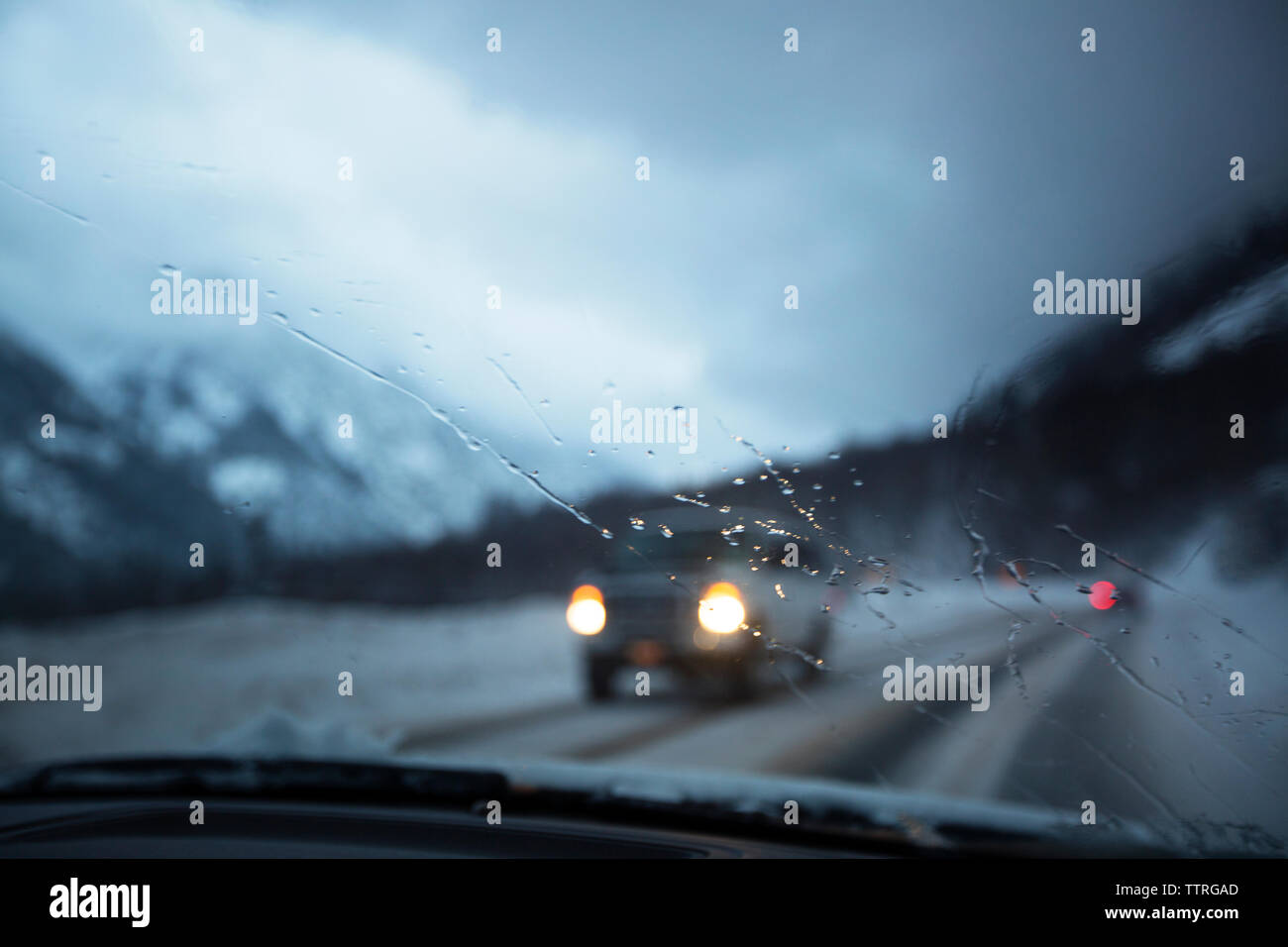 Car seen through windshield during winter Stock Photo - Alamy