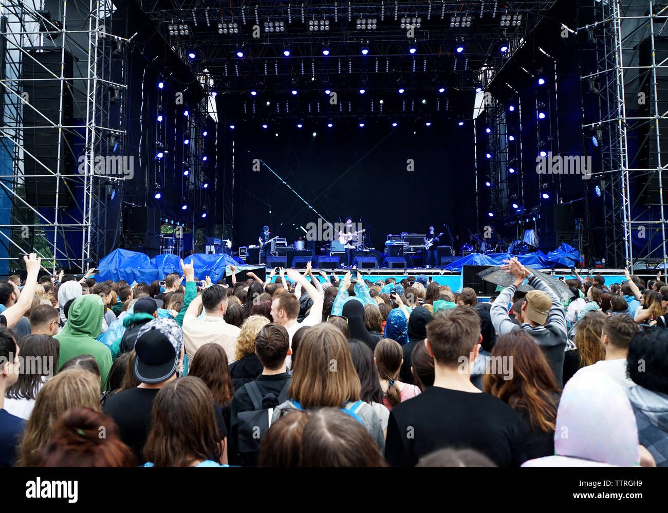 Crowd enjoying music at concert Stock Photo - Alamy