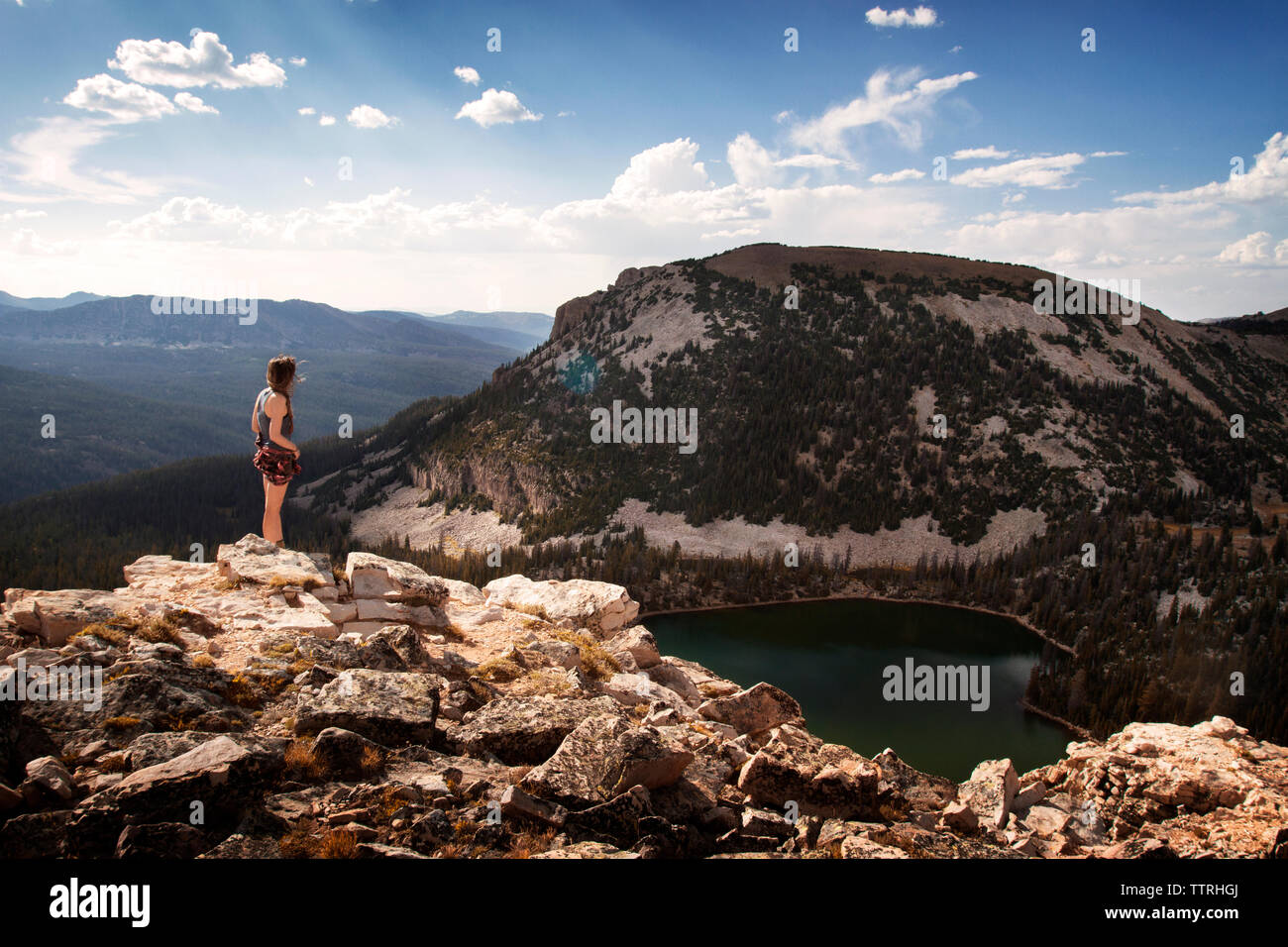 Woman standing cliff full length hi-res stock photography and images ...