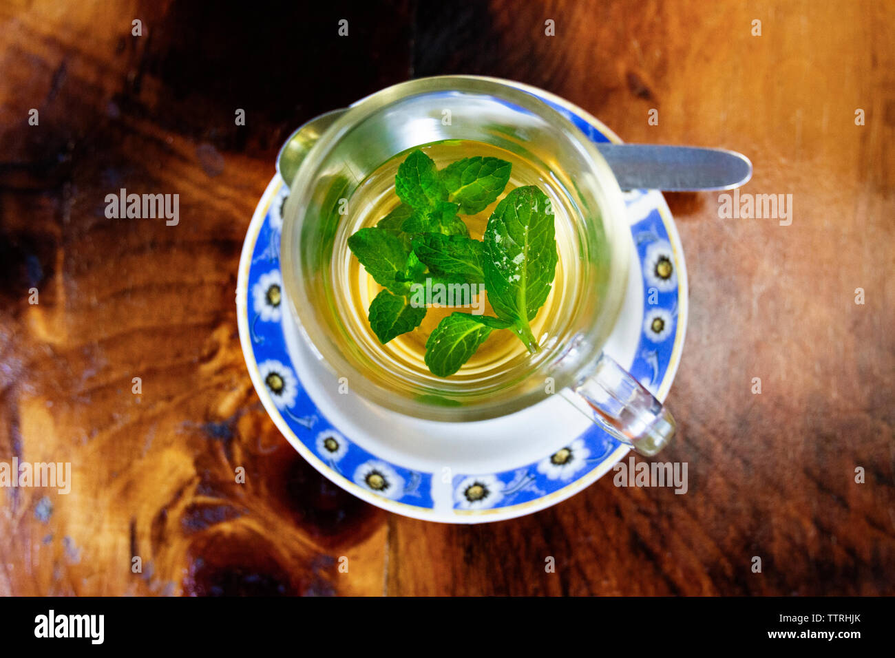 Overhead view of herbal tea served on wooden table Stock Photo - Alamy