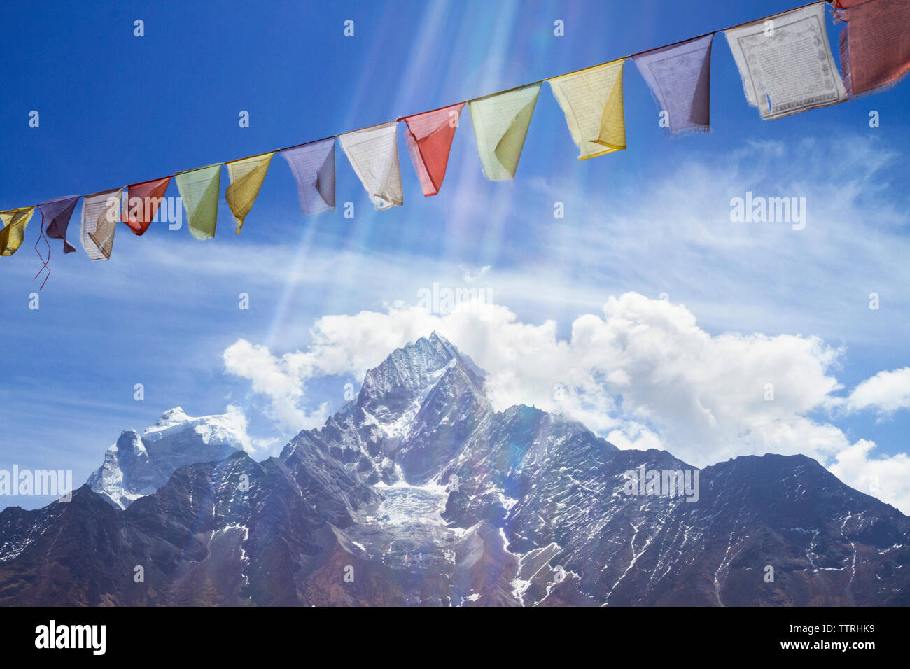 Everest peak with prayer flags hi-res stock photography and images - Alamy