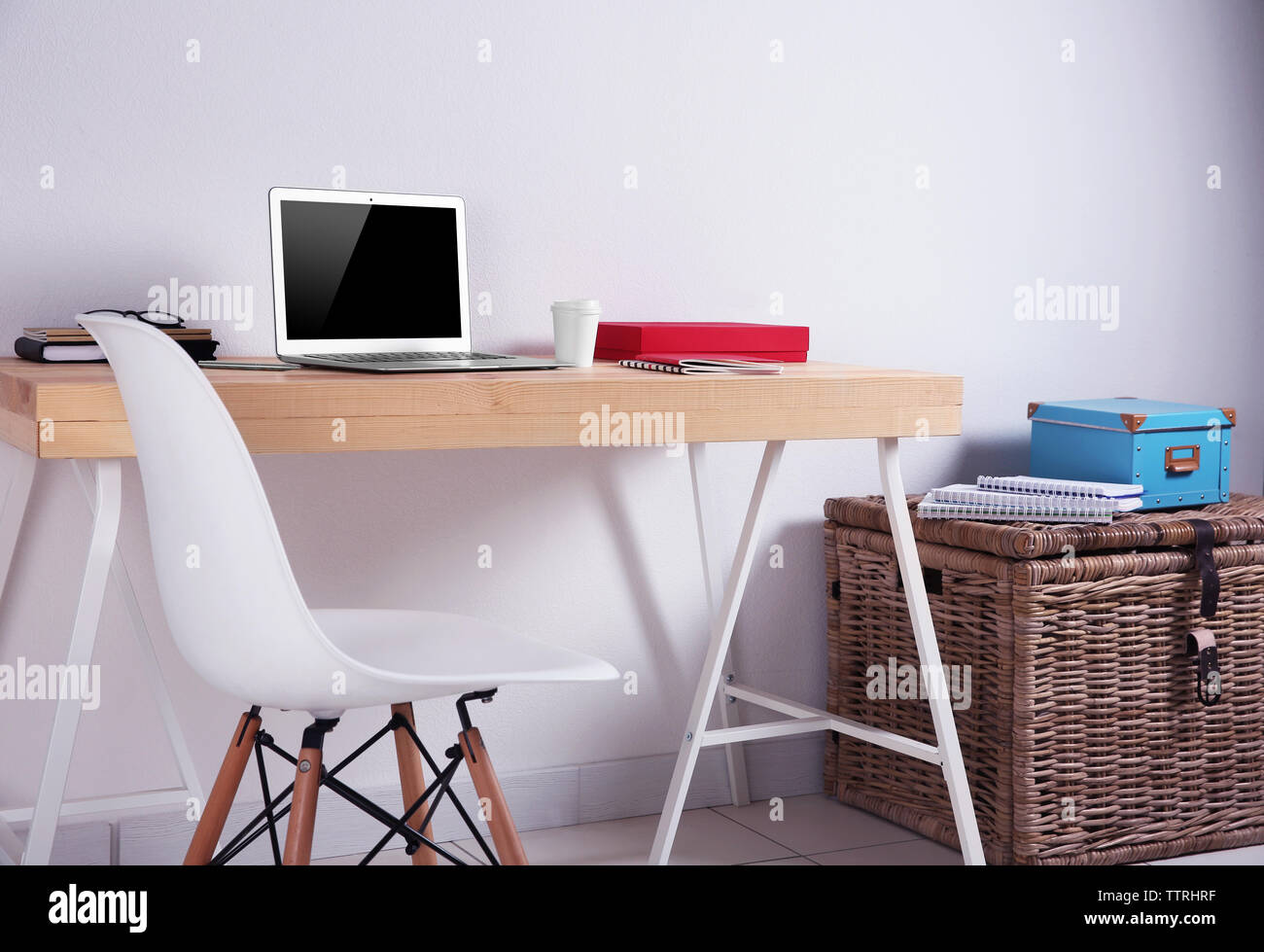 Working place on white wall background Stock Photo - Alamy