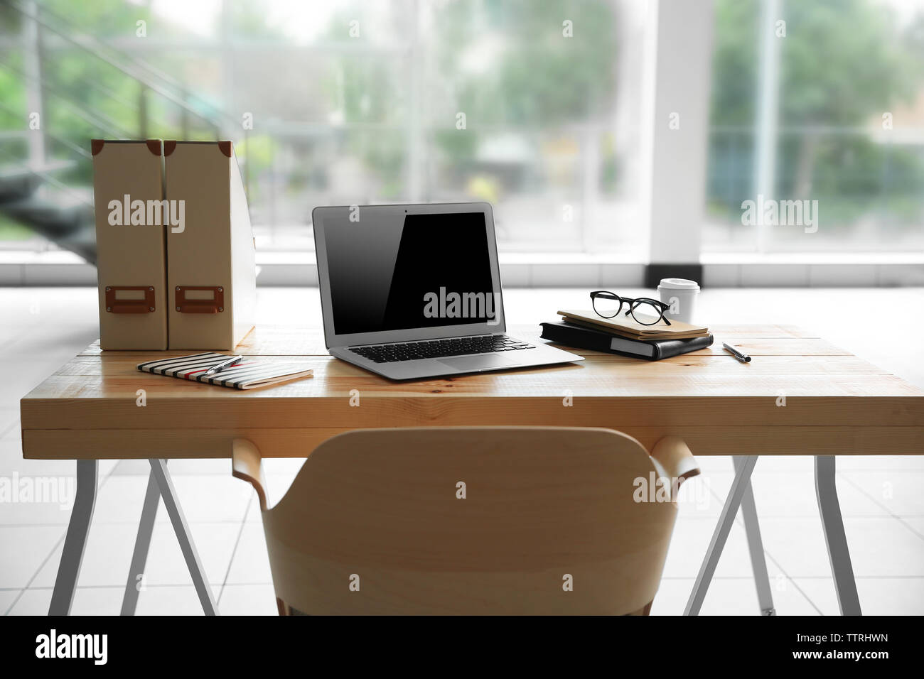 Working place on window background Stock Photo - Alamy
